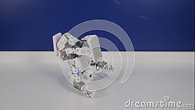 Experimental Robot is Doing a Somersault on Table in Laboratory Stock ...