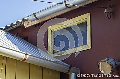 Small Rectangular Window On The Roof Of The Building Royalty-Free Stock ...