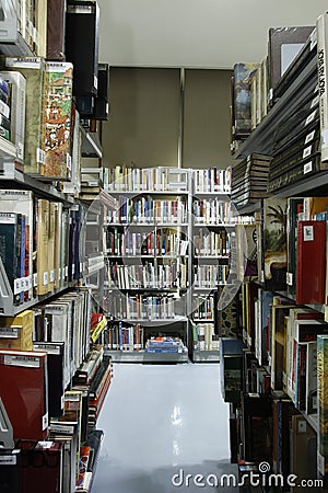 Small, Well-lighted Modern Library With Multiple Shelves Editorial ...