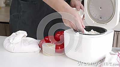 Man Cooking Rice Using Electric Rice Cooker Stock Video - Video of ...