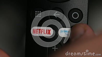 Smart Tv Controller with Netflix and Prime Video Buttons. User is ...