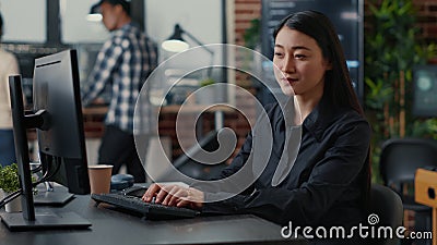 Smiling Asian Database Software Developer Writing Programming Code on Computer Keyboard Stock ...
