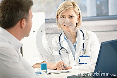 Doctor Explaining To Patient Stock Image - Image of coat, hair: 18216185