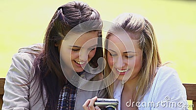 Smiling Friends Looking at a Digital Camera Stock Footage - Video of ...