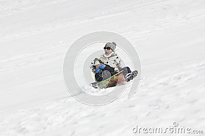Snow Sledding Crash Royalty Free Stock Photo - Image: 29699165