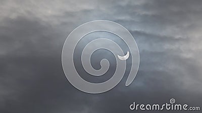 A Solar Eclipse in Cloudy Weather through a Cloud. Partial Solar Eclipse. Stock Video - Video of ...