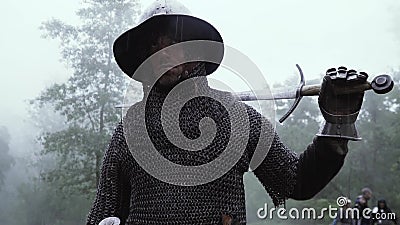 Soldier in Chainmail Armor with a Sword on His Shoulder is Looking ...