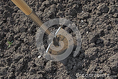 A Spade Digging The Soil Royalty Free Stock Image - Image: 2198236