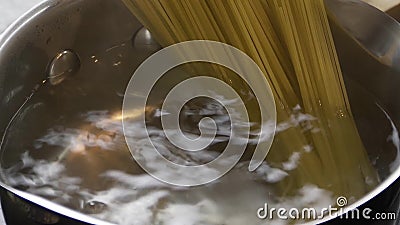 Spaghetti is Lowered into a Pot of Boiling Water Stock Video - Video of ...
