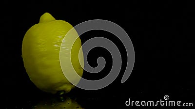 Spinning Lemon in Slow Motion on a Black Background Stock Footage ...