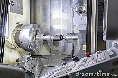 A Splined Shaft With Teeth Is Installed In The Milling Machine At The ...
