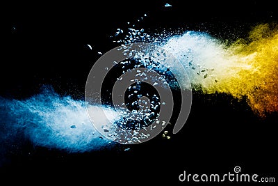 Split Debris Of Stone Exploding With Blue Powder Against Black ...