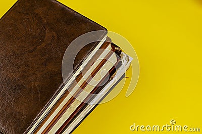 Stack Of Old Diaries Lying On Yellow Background Royalty-Free Stock ...