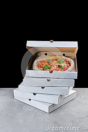 Stack Of Pizza Box With Pizza Inside. Pizza Delivery. Box On Black ...