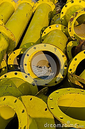 Stack Of Yellow Steel Pipe Stock Image | CartoonDealer.com #24557431