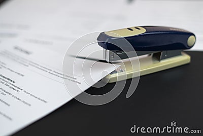 A Stapler And The Documents Files In Office On The Table, Staple The ...