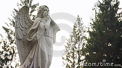 Statue of a pensive angel stock footage. Video of angel - 129311938