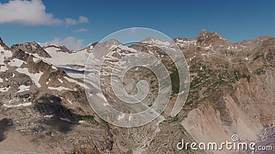 Steep Rocky Mountains with Cliffs and Ledges, Covered with Snow and ...