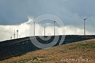 Storm clouds over wind turbines - Stock Image - Everypixel