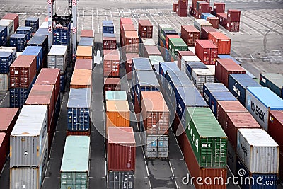 Stowed Containers In A Rows From Different Shippers On The Pier Of ...