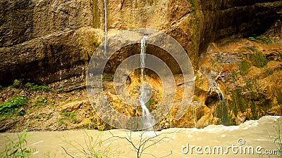 Streams of Water Flow Down from the Mountains into the River. a Small ...