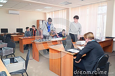 Students Connect Wires Control Panel With Small Test Bench For ...