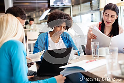 Teacher Talking To Students in College Class Stock Photo - Image of ...