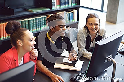 Students Working On Computer In A College Library Stock Photo - Image ...