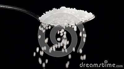Sugar Falling from the Spoon in Dark Studio. Slowmotion, 180 Fps Shot ...