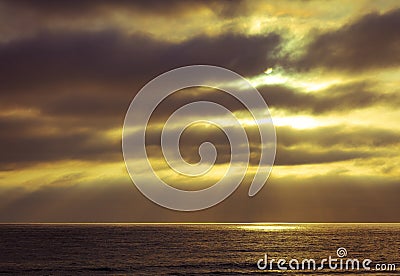 Sun Radiates Through A Cloud And Creates Ocean Spotlight Stock Photo ...