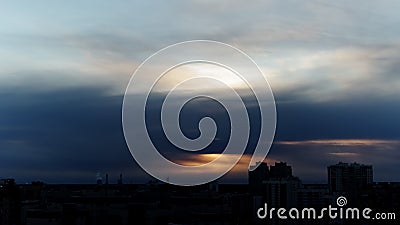 Sun in the Sunset Clouds Against the Backdrop of Urban Silhouettes of ...