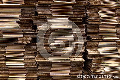 Supply Of Unassembled Cardboard Boxes In The Warehouse. Stack Of ...