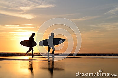 Surfers Walking In The Beach Stock Photo - Image: 78255490