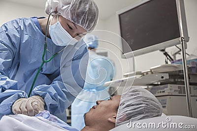 Surgeon Consulting A Patient, Getting Ready For Surgery Royalty Free ...