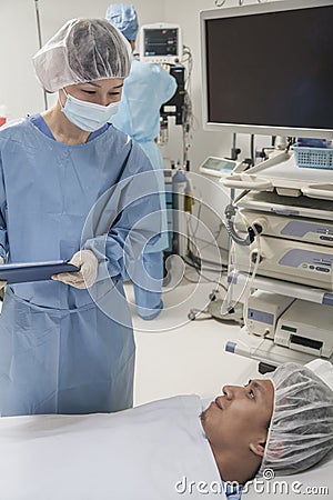 Surgeon Consulting A Patient, Getting Ready For Surgery Stock ...