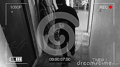 Surveillance Camera Caught the Robber in a Mask with a Crowbar Stock ...