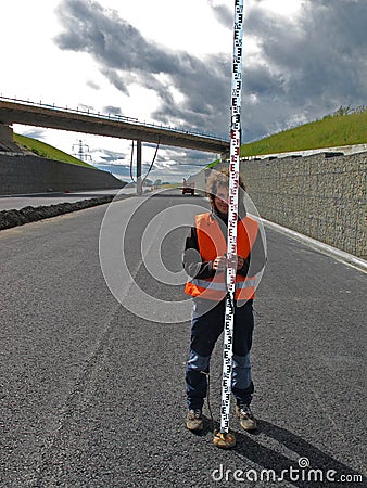 Surveyor With Levelling Staff Royalty Free Stock Photo - Image: 17157665