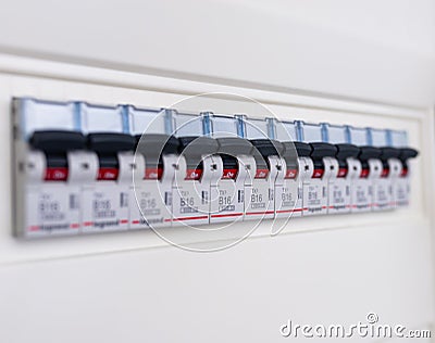 Switches In Electrical Fuse Box. Many Black Circuit Breakers In A Row ...