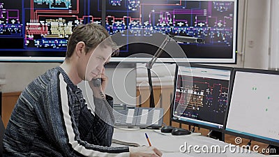 System Administrator Working on Computer Control Room of Electric Power ...