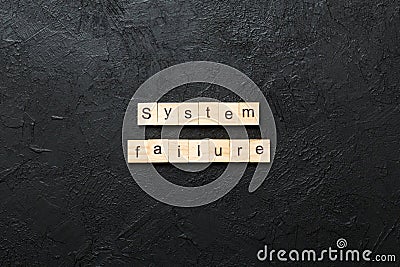 System Failure Word Written On Wood Block. System Failure Text On Table ...
