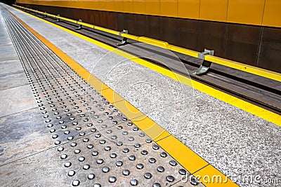 Tactile Paving For Visually Impared At Subway Platform Edge. Yel ...