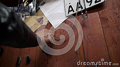 Take Car Keys from the Wall. Footage. Male Hand Takes Car Keys with ...