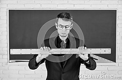Teacher Man At Chalkboard Holding Ruler, Math Subject Concept Royalty ...