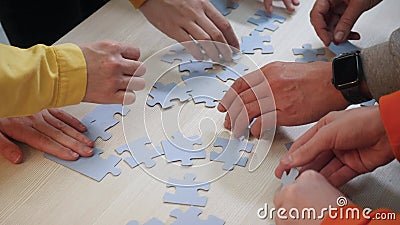 Teamwork Concept. a Group of People a Team Assemble Jigsaw Puzzles ...