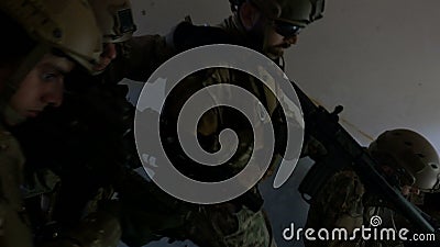 Teamwork of Special Military Unit Descending Stairs during an Armed ...