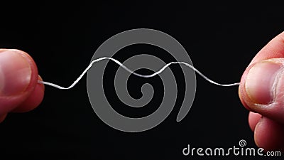 Teeth Cleaning Thread. Hands Holding Teeth Cleaning Thread Stock Video ...