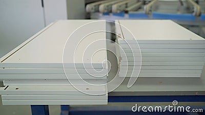 There is a Stack of OSB Sheets on the Table. Construction Material. OSB ...