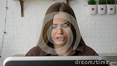 Thoughtful Concerned Woman Working on Laptop Computer Looking Away ...