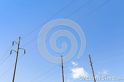 Three Electrical Power Poles Side By Side, Strain Insulators, Against A ...