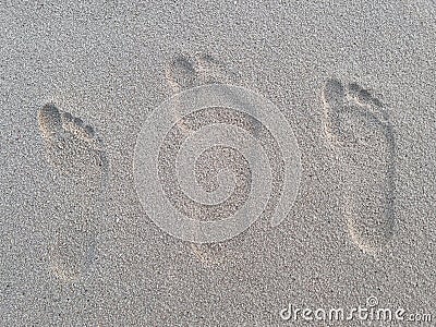 Three Footprints On The Sand Royalty-Free Stock Photo | CartoonDealer ...